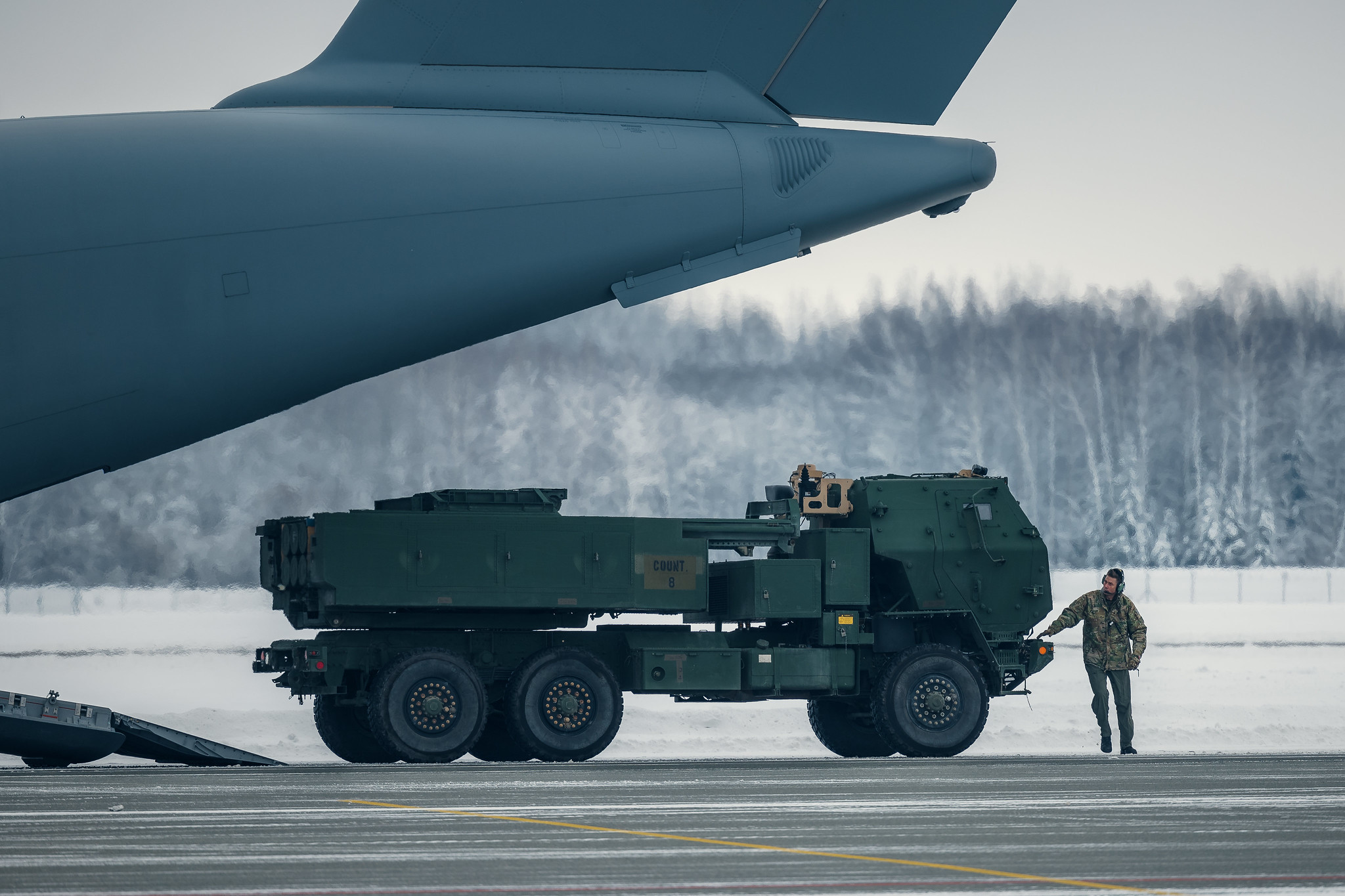 A400M flies HIMARS in firing position